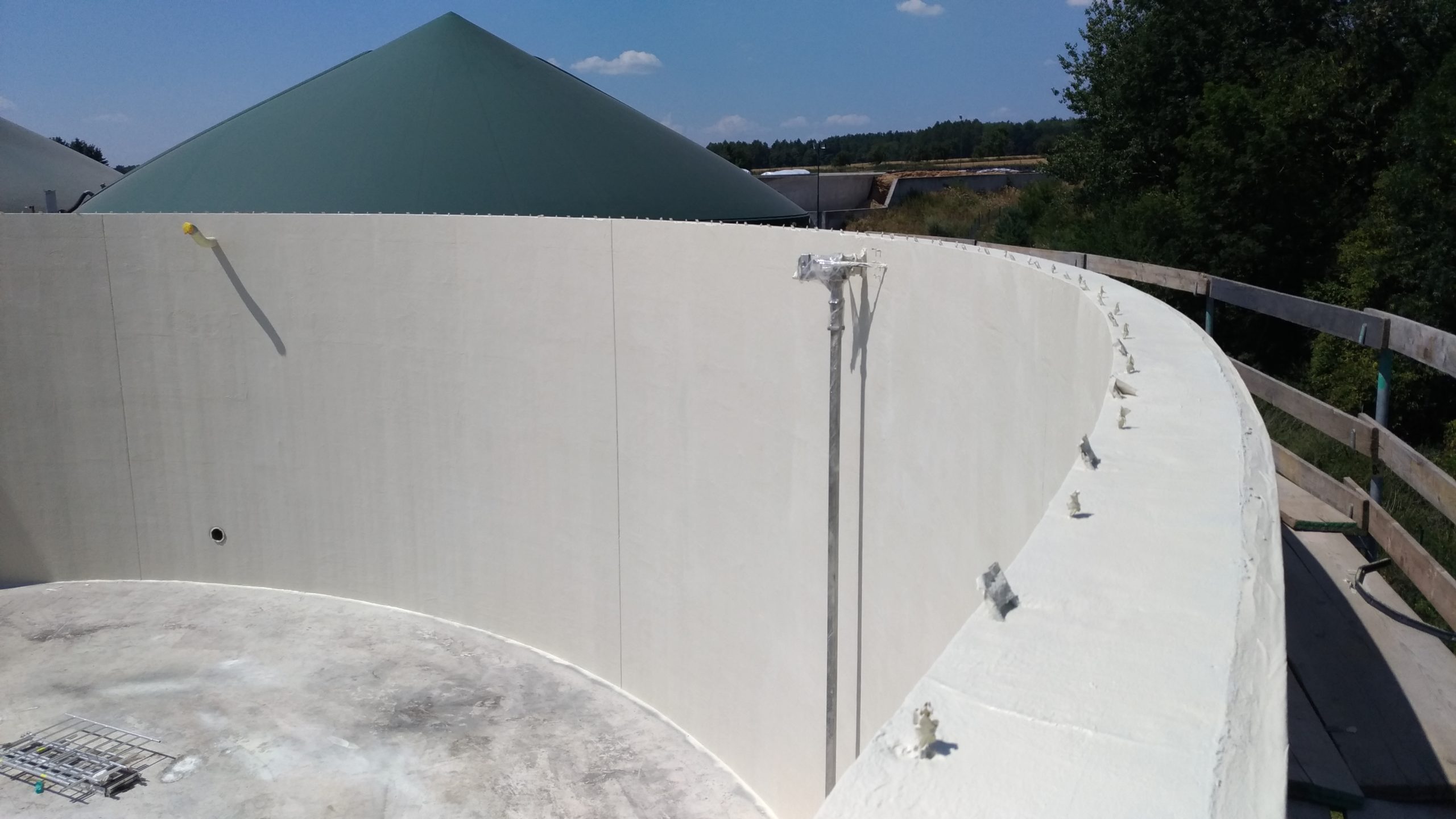 Protection of the interior surfaces of concrete tanks for biomass ...